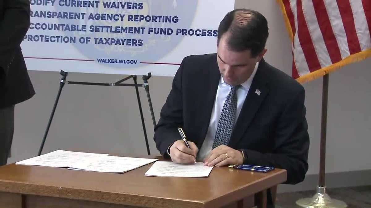 Gov. Walker signs GOP 'power grab' legislation