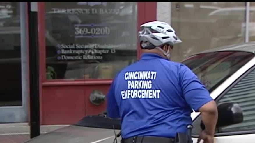 Police: After getting parking ticket, angry man throws water on officer