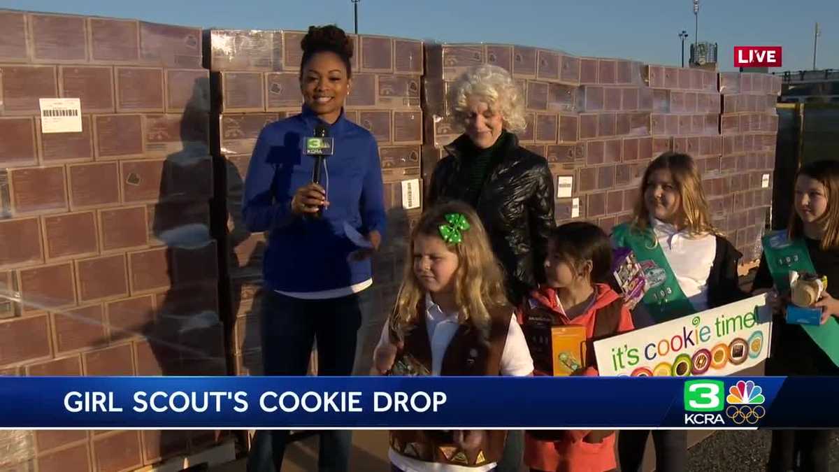 Hundreds of Girl Scouts pick up cookies at Raley Field