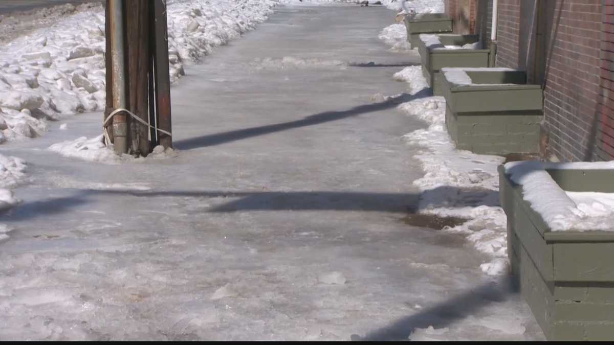 Shadyside sidewalk covered in thick ice
