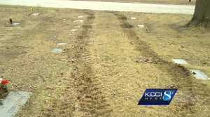 Cemetery visitor finds tracks over gravestones