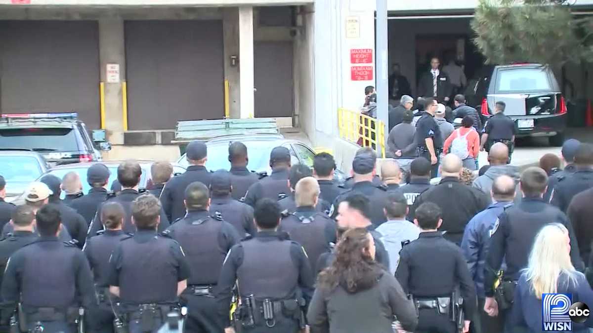 Milwaukee Officer Kou Her's body arrives at Medical Examiner's Office