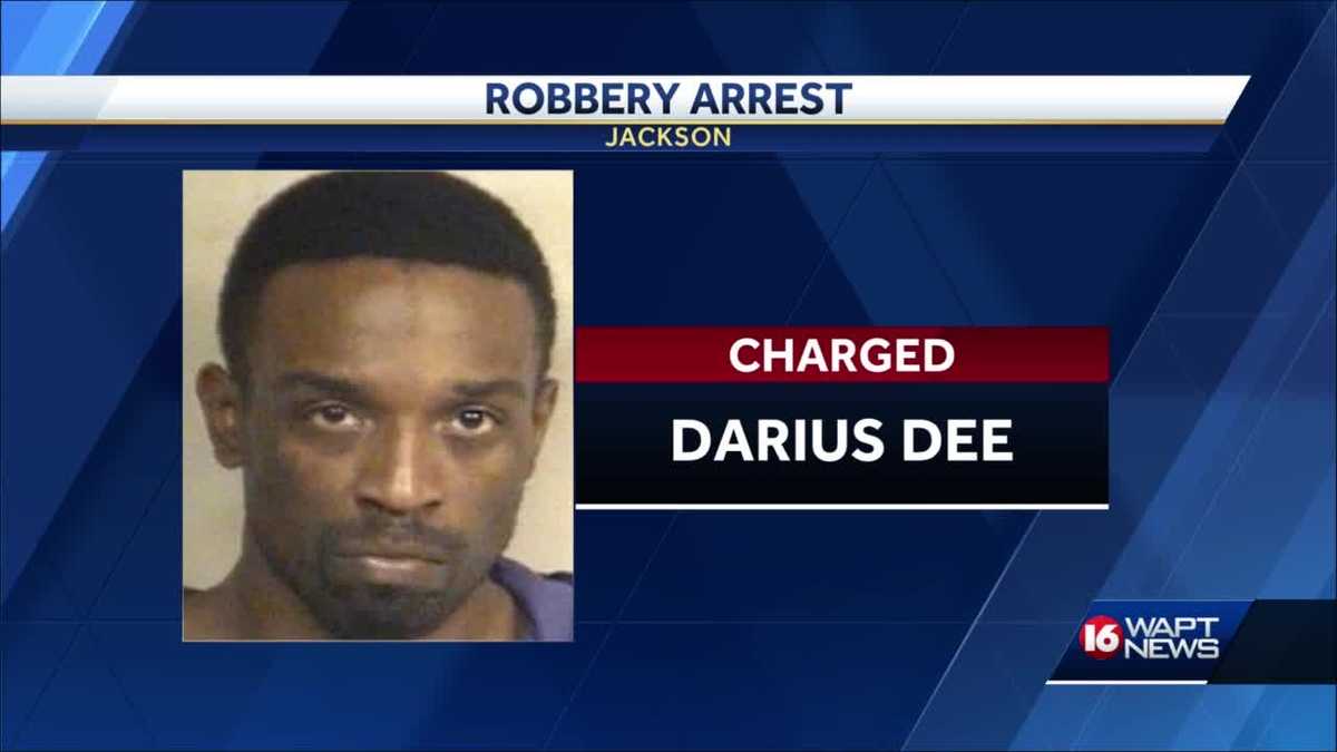 Police make arrest after woman held at gunpoint, robbed