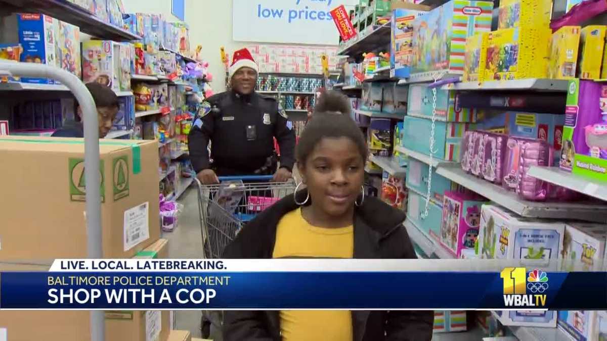 Baltimore City police treat children in Shop with a Cop