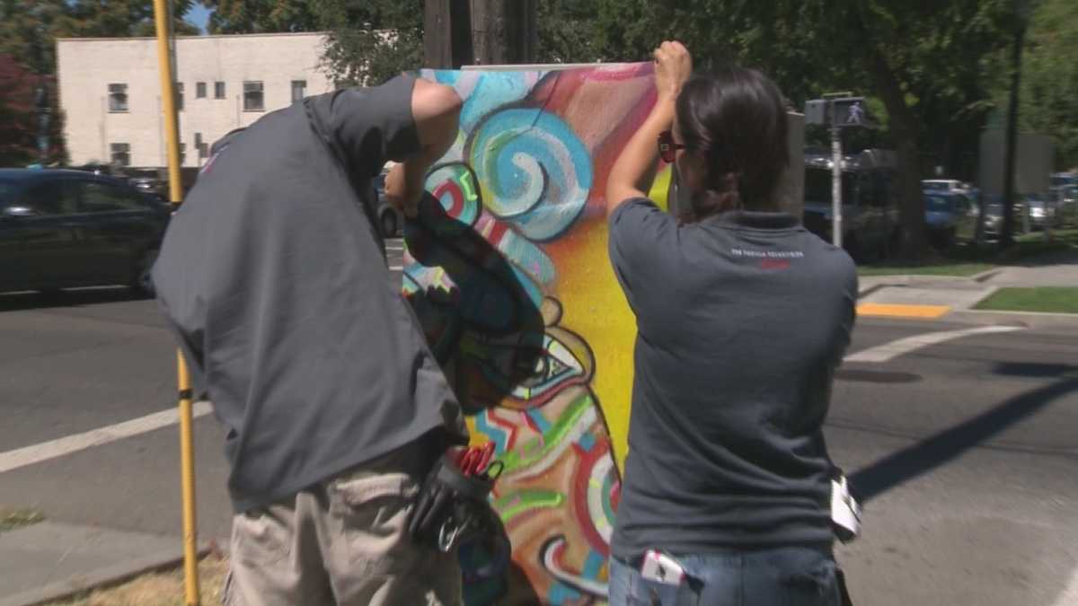 Artist brighten the streets with utility art boxes