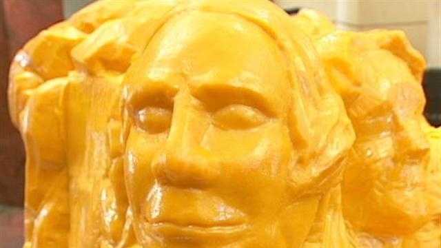 Artist builds enormous cheese sculpture of Mt. Rushmore