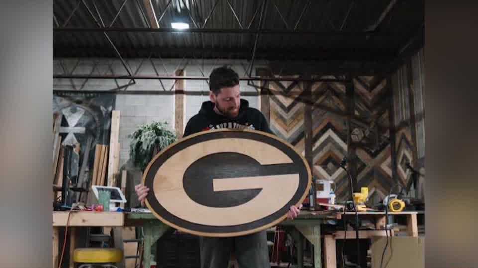 Milwaukee woodworking artist creates all 32 NFL logos for draft