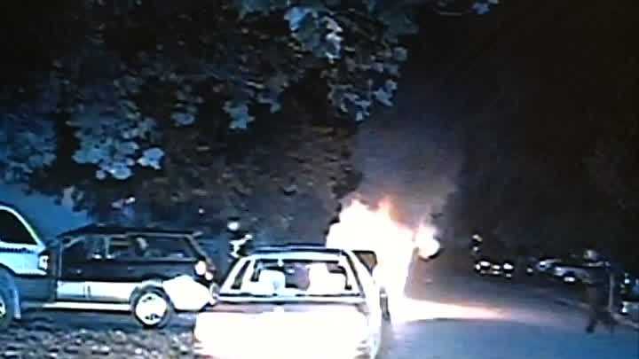 RAW VIDEO: Officer rescues man from burning car