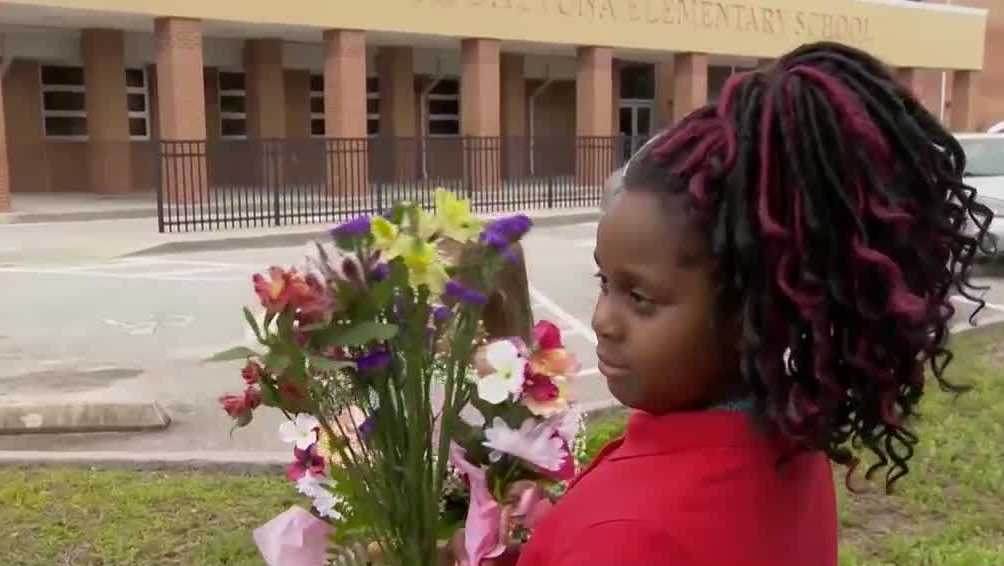 Local groups pass out flowers, teddy bears to victims of bullying at school