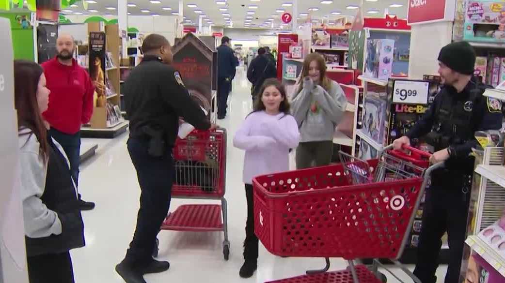 Officers, firefighters, students shop for 'Heroes & Helpers'