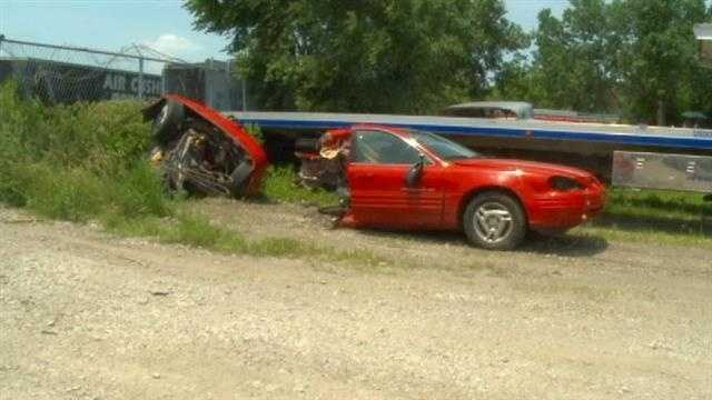 Car split in half during crash, driver still missing