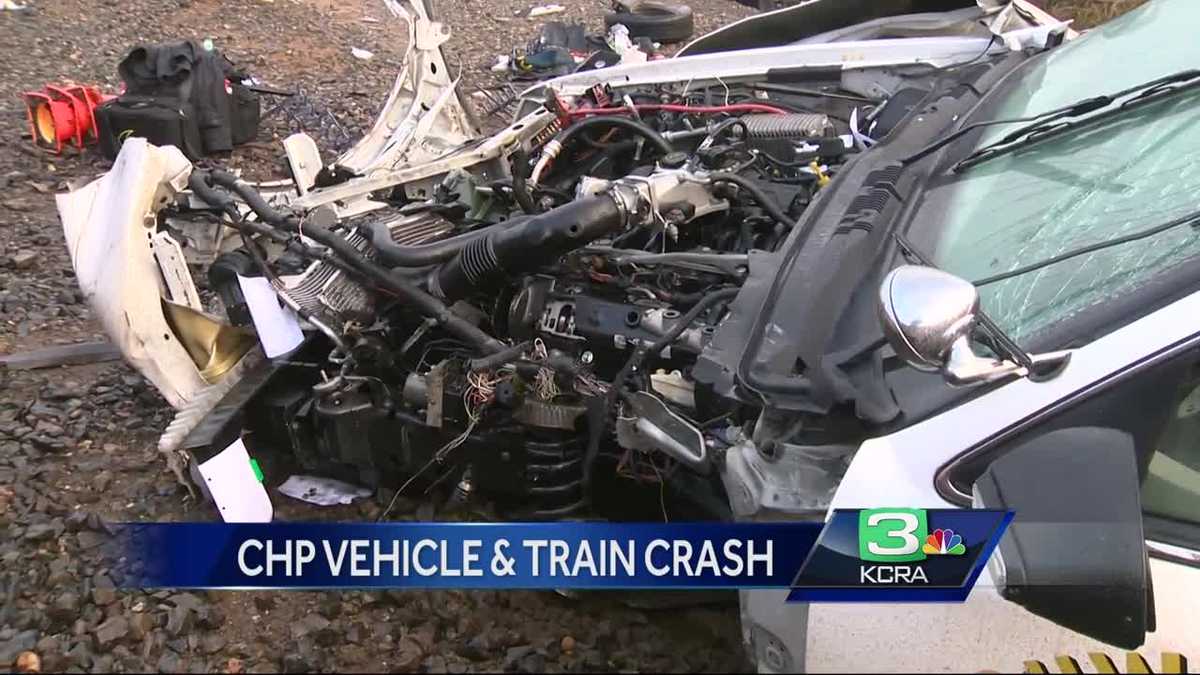 Train hits CHP car while on scene of accident