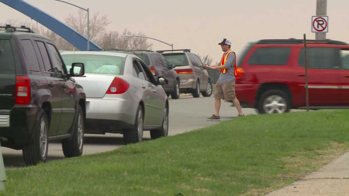 Traffic Dad keeps cars moving at school