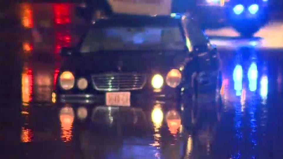 Car gets stuck in flood waters in Quincy