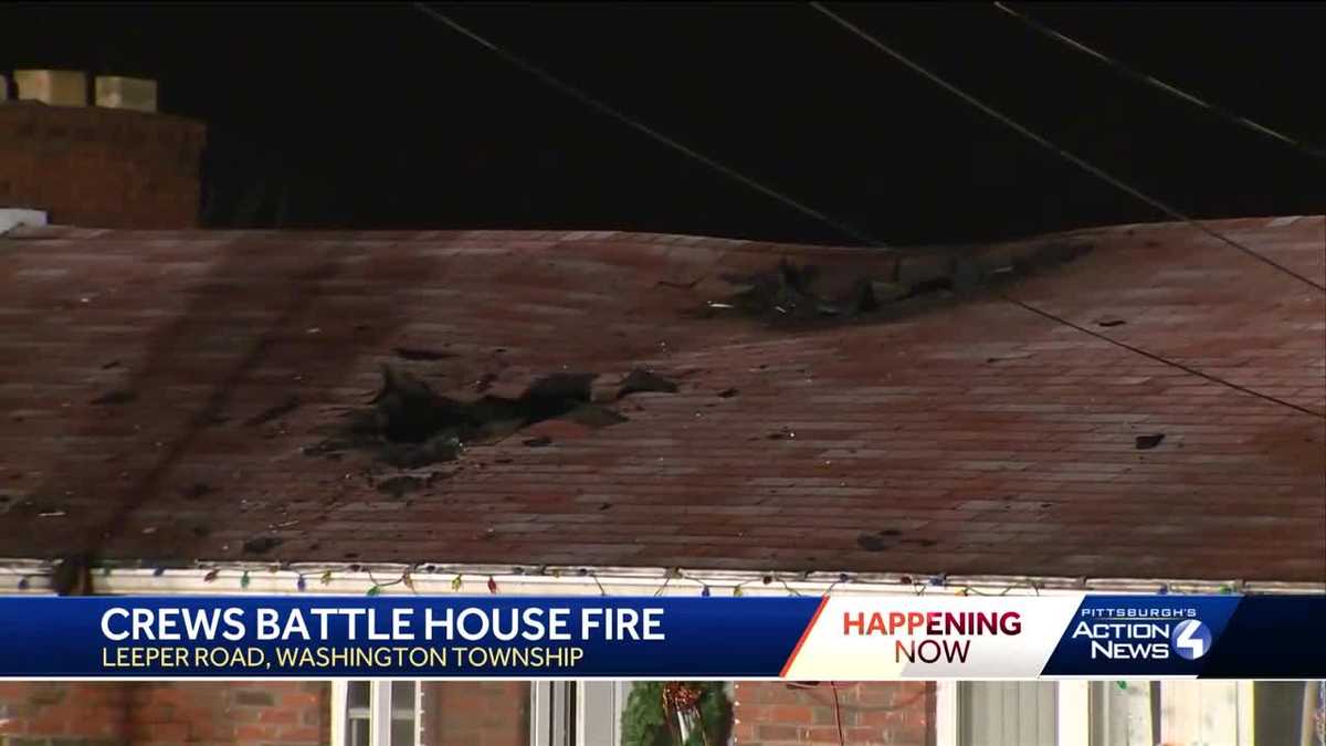 Crews battle house fire in Washington Township