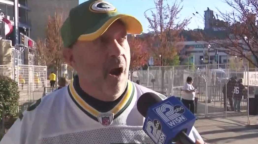 Green Bay fans cheer on Packers, face off against former QB Rodgers