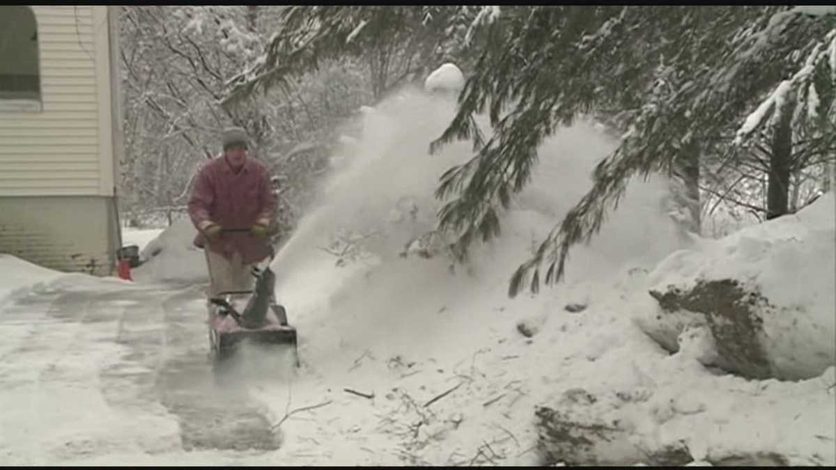 Snow piles high in late-winter storm