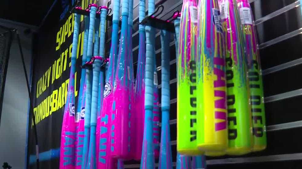 Omaha father-son business owners College World Series baseball bat