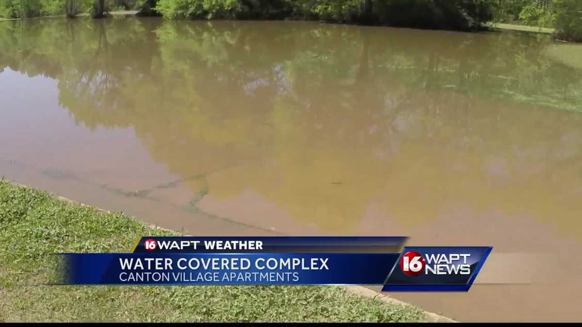 Canton residents clean up after flooding