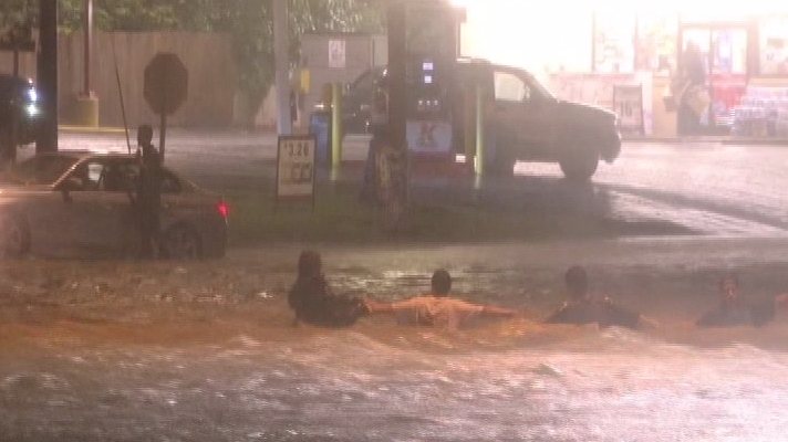 Fire crews rescue people from flooding in Columbia