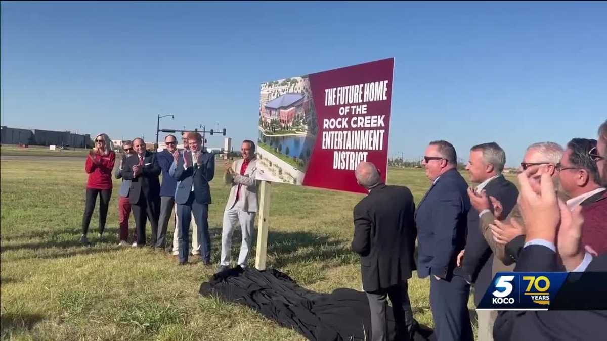 Norman unveils sign for new entertainment district amid obstacle