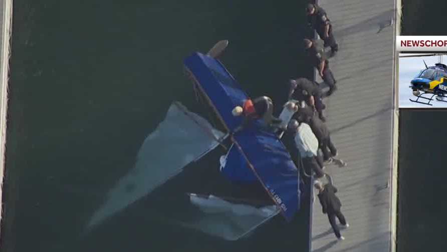 Milwaukee firefighters rescue one person after sailboat capsizes in ...