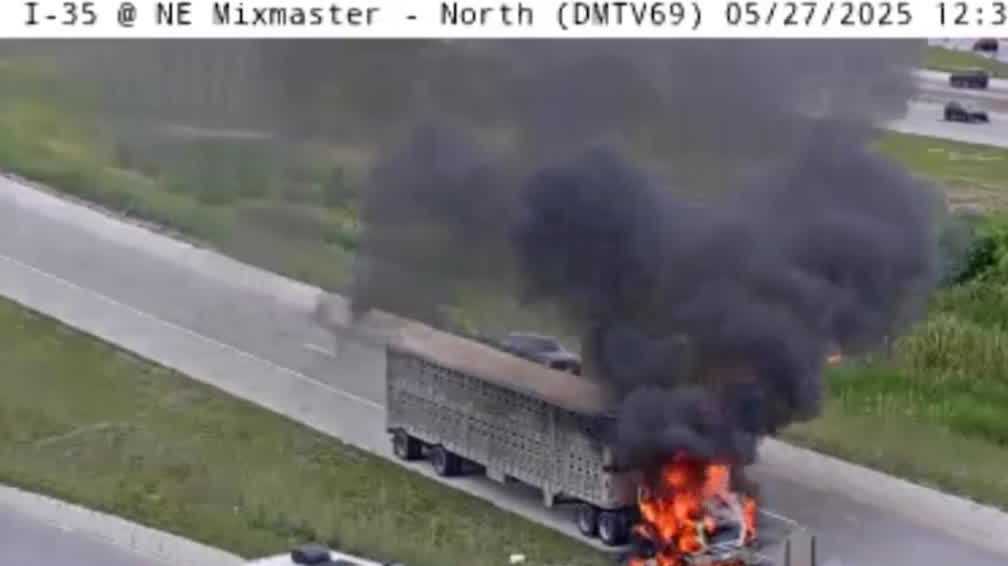 WATCH: Semi-truck transporting hogs catches fire along I-35