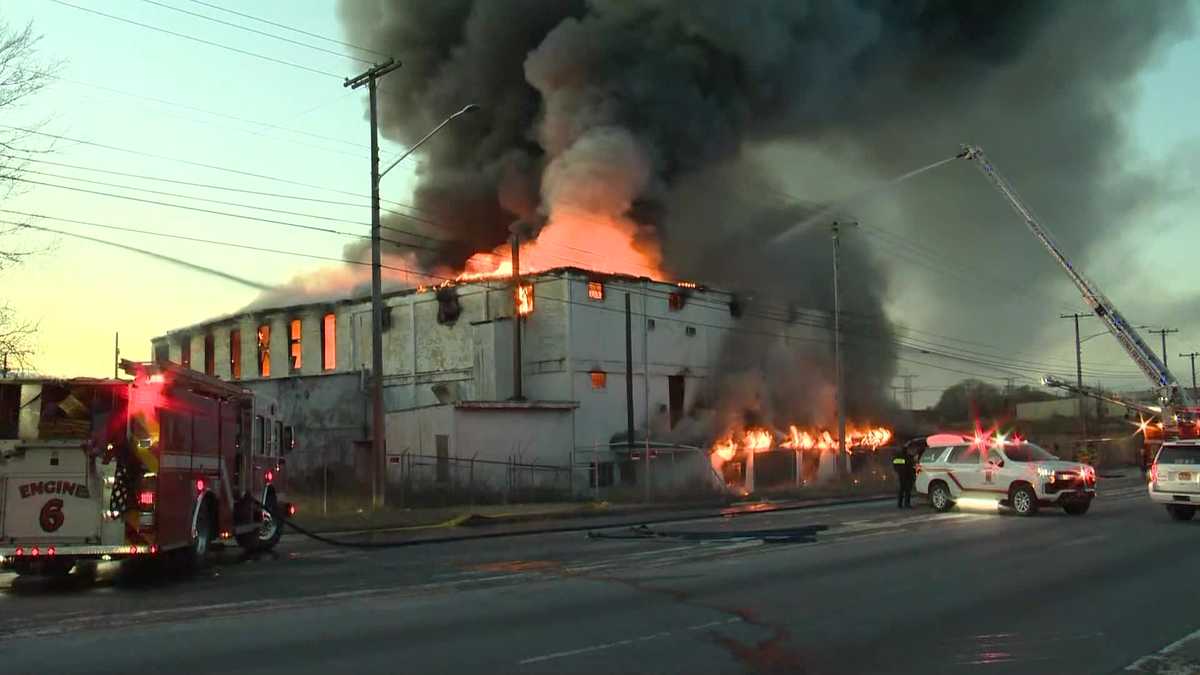 Firefighters deal with frozen fire hydrants to battle massive fire at ...