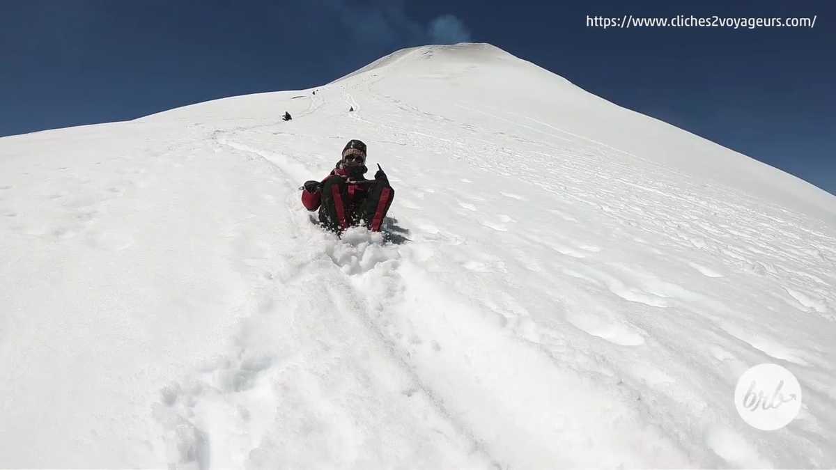 Hikers sled down active volcano