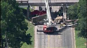 Highway overpass partial bridge collapse scene