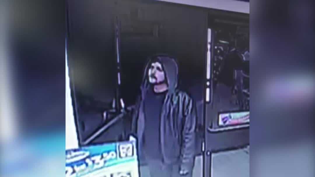 Peninsula police seek public's help identifying armed robber Peninsula police seek public's help identifying armed robber