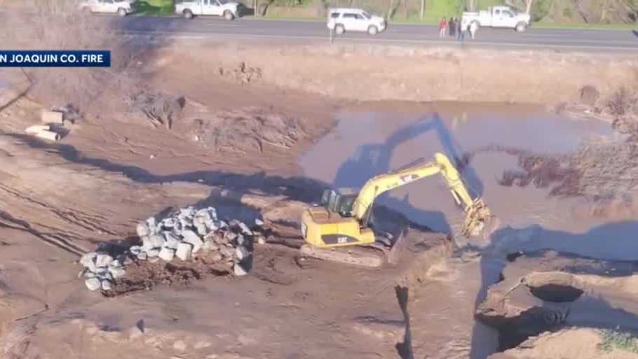Road washout in Tracy caused by retention pond failure