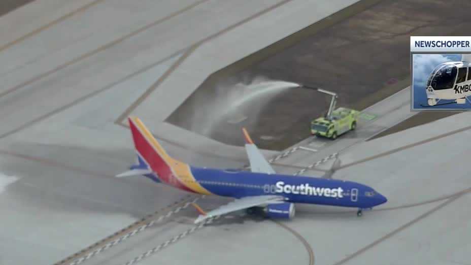 Kansas City officials water salute first plane into new KCI terminal