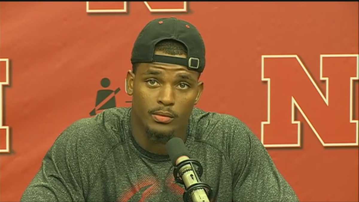 Ameer Abdullah talks with reporters