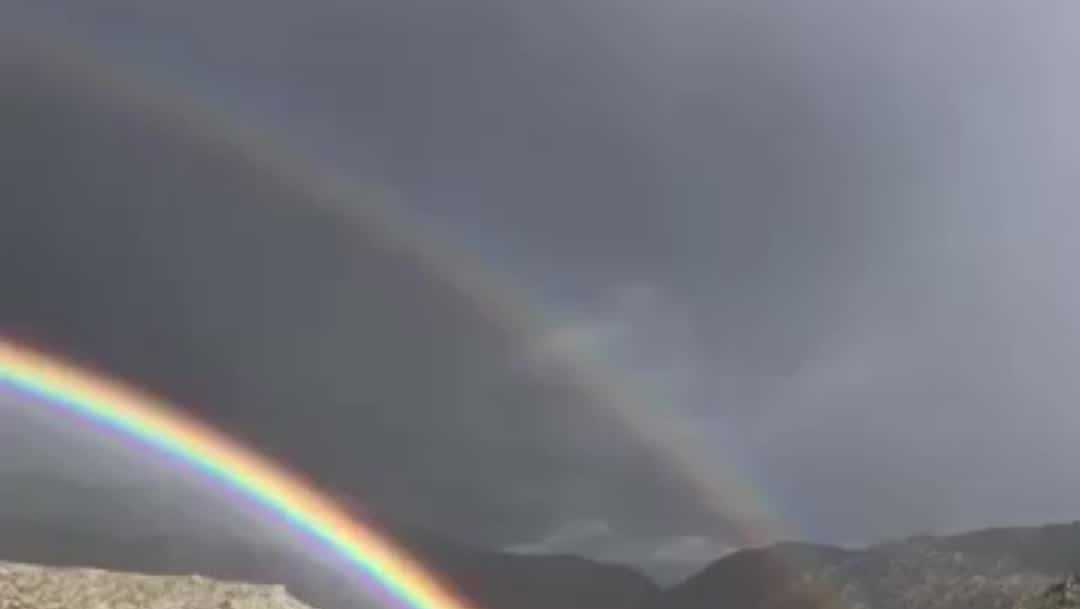 Albuquerque foothills shows off double rainbow