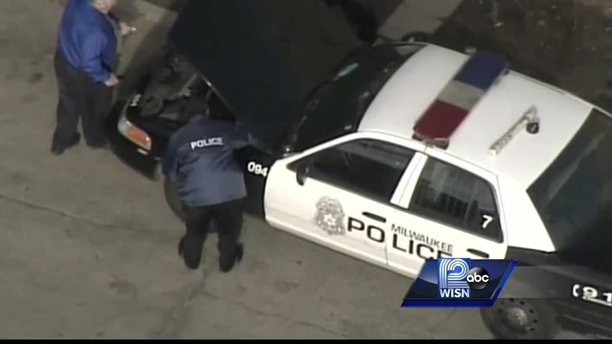 MPD squad car shot, officer hurt by shattered glass