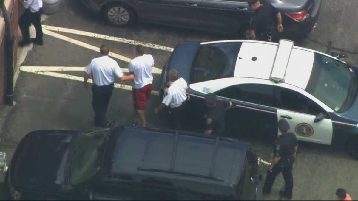 Ex-Pats Aaron Hernandez in shackles arriving at court
