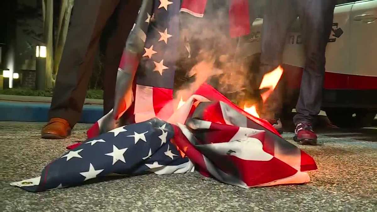 Protesters burn 2 American flags in front of Hoover City Hall