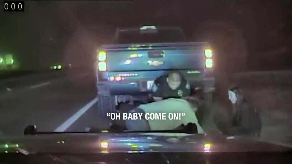 CAUGHT ON CAMERA: Cop helps save woman after heart attack