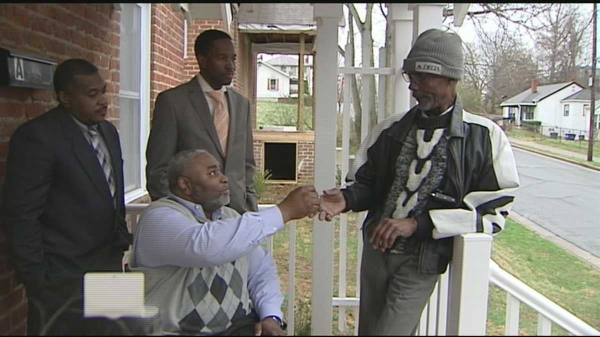 Homeless Army Vet receives keys to new home
