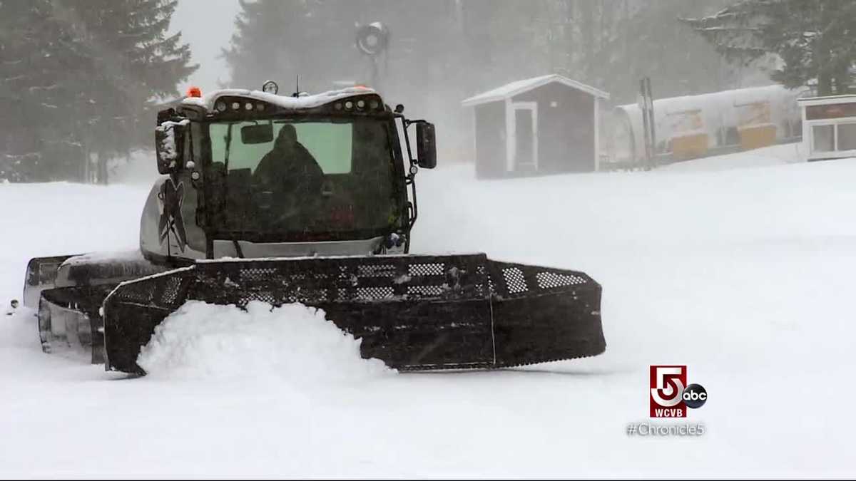 Take a trip up a trail in a snowcat
