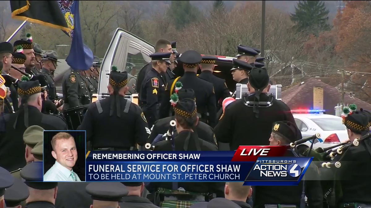 Police pallbearers carry New Kensington Officer Brian Shaw's casket ...