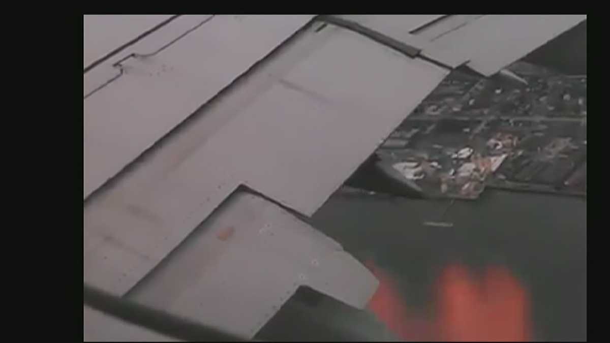 Raw Video: Flames shoot out during flight to Manchester