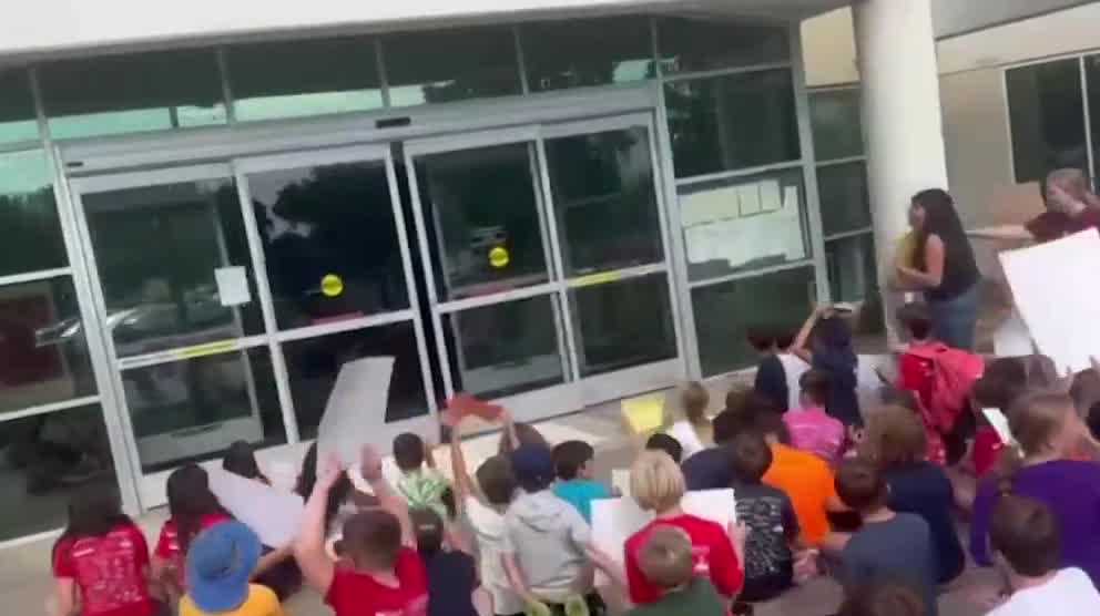 Students, parents rally in support of reassigned Sacramento teacher