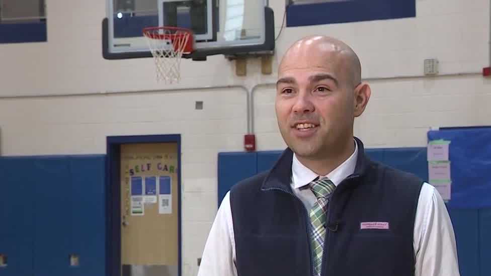Meet the principal who made the epic half-court shot