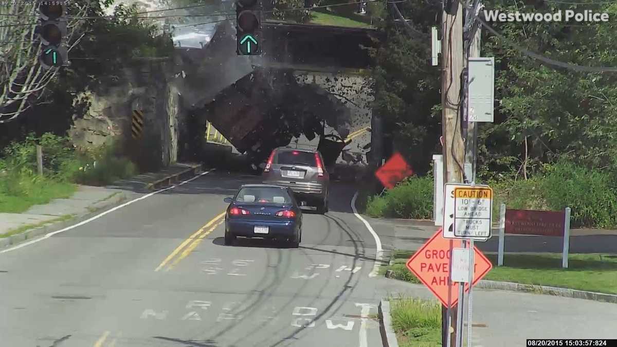 Surveillance video shows truck smashing into Westwood bridge Surveillance video shows truck smashing into Westwood bridge