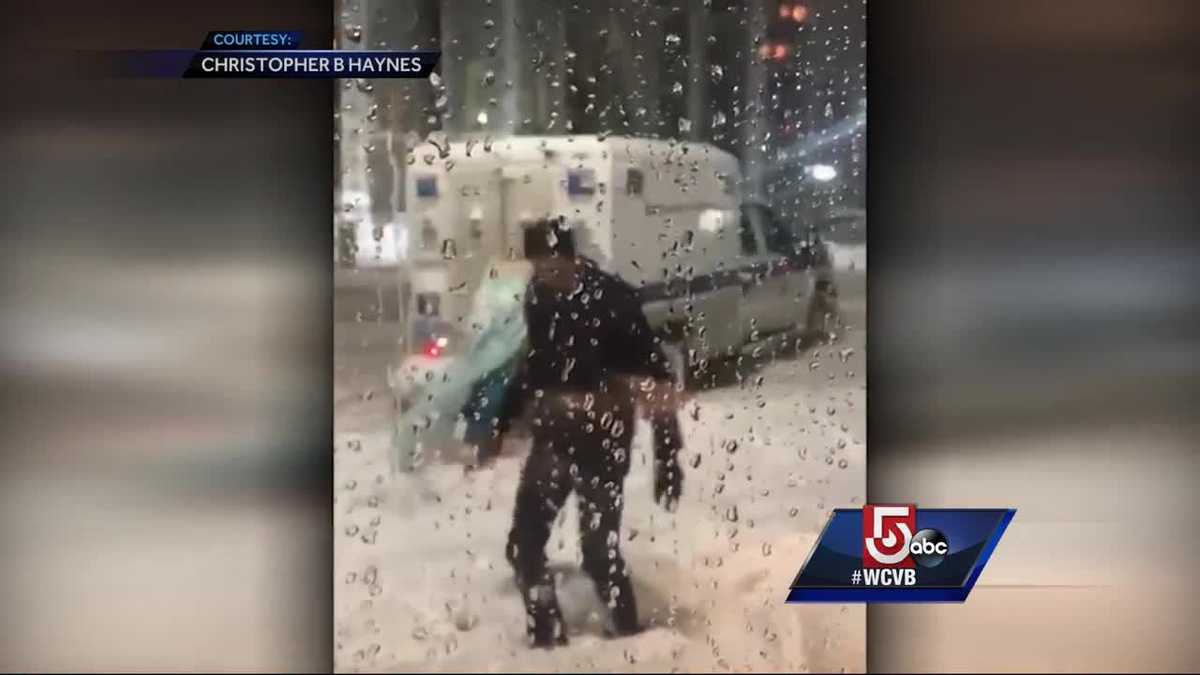 Elsa pushes Boston police wagon out of snow