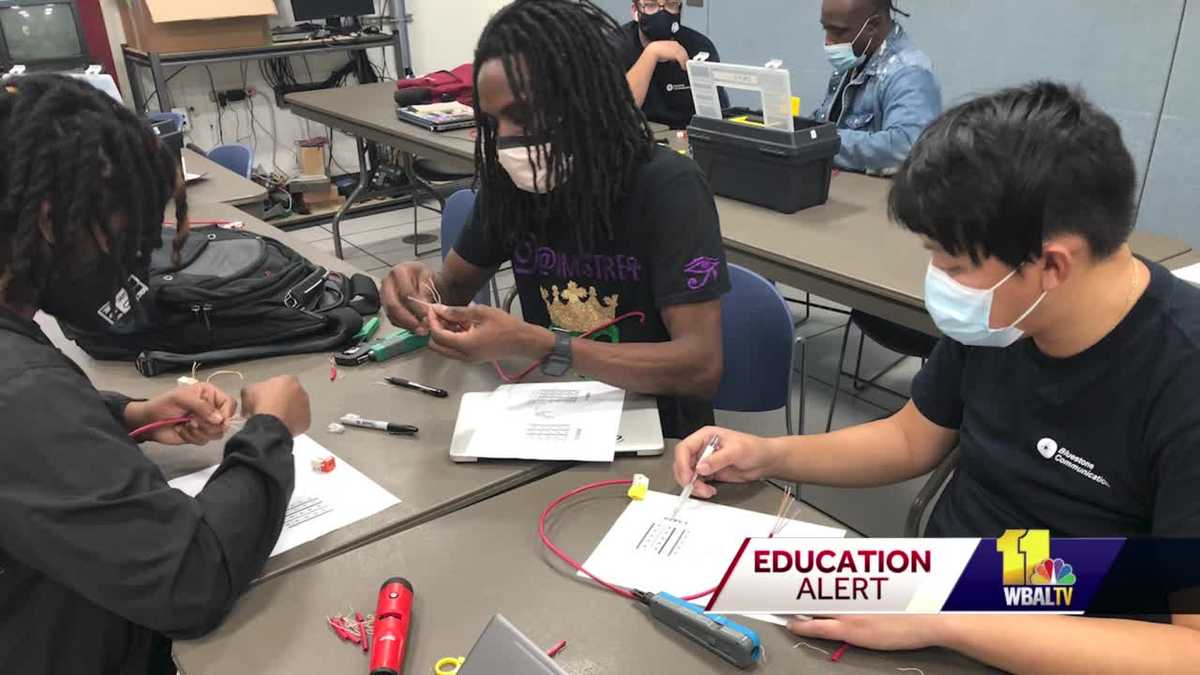 Workers receive technical training through apprenticeship program