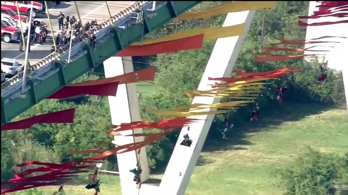 Greenpeace Activists Dangle From Houston Bridge
