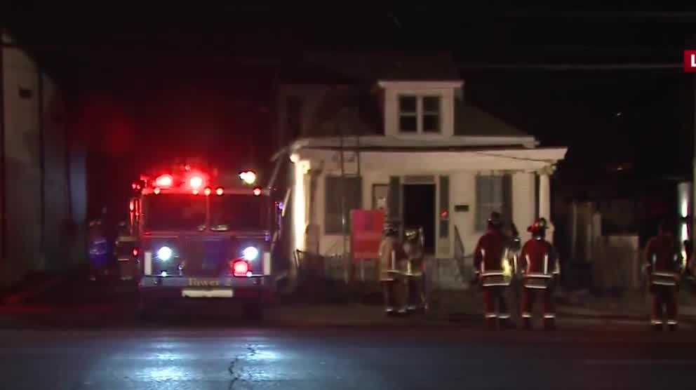 Crews work to put out blazing house fire in downtown Louisville